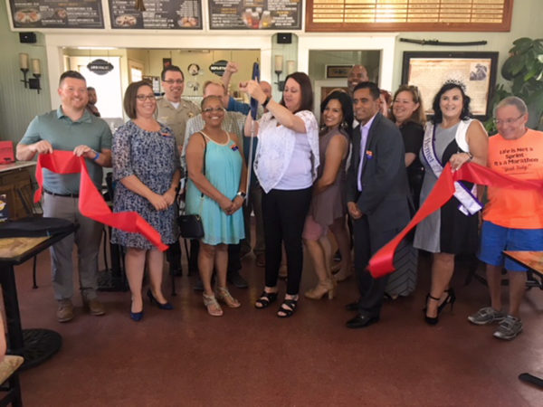 A beautiful afternoon capped of by a ribbon-cutting, astatic food and ...